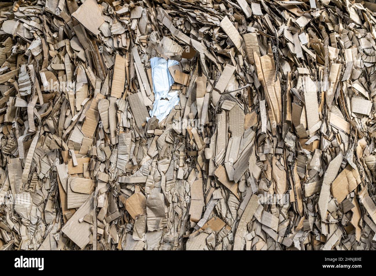 A lot of pressed waste paper ready for recycling background Stock Photo ...