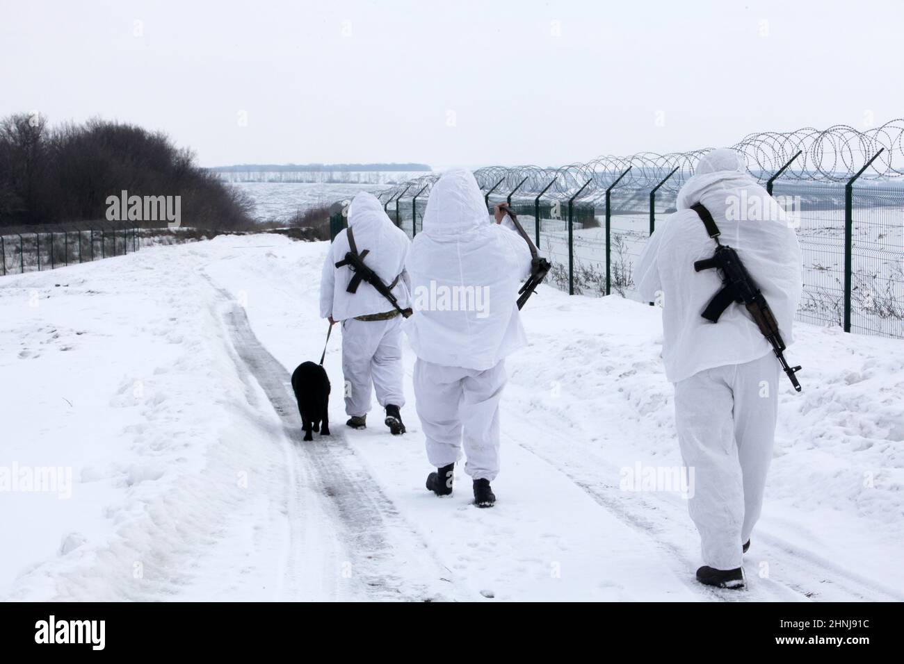 KHARKIV REGION, UKRAINE - FEBRUARY 16, 2022 - Three border guards in ...