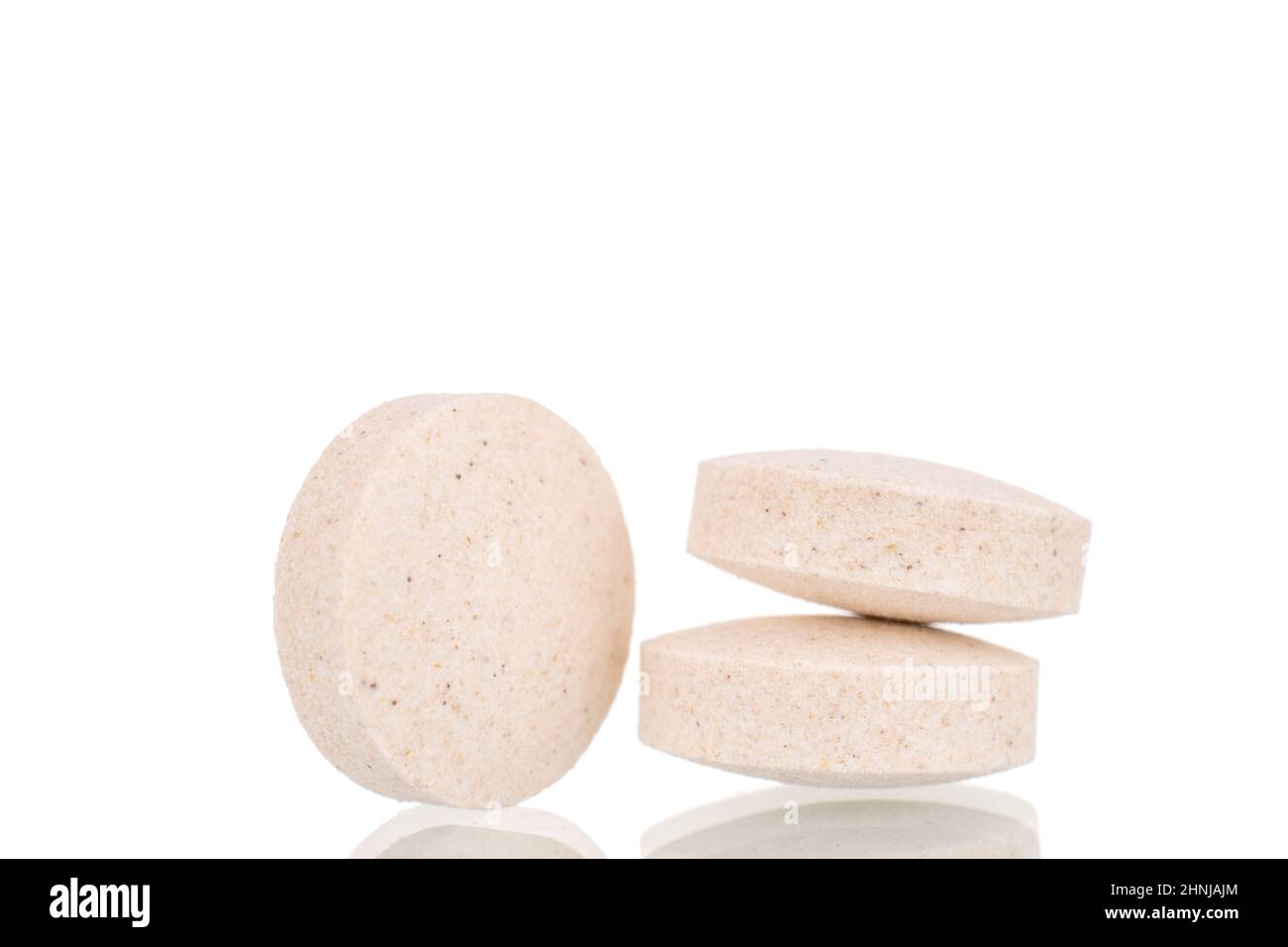 Three medical tablets, macro, isolated on a white background Stock ...
