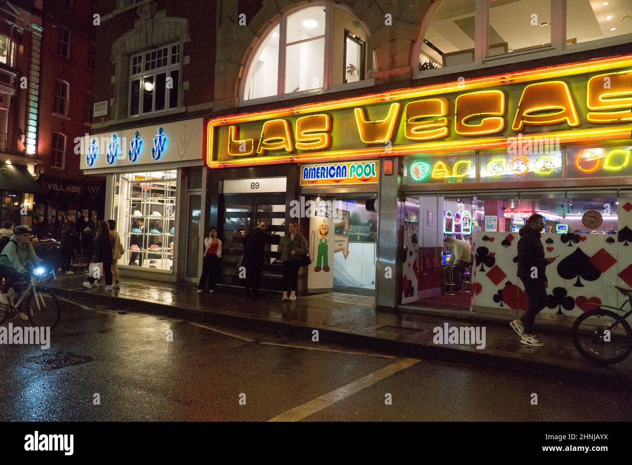 London, UK, 16 February 2022: In Soho at night the lights are ...