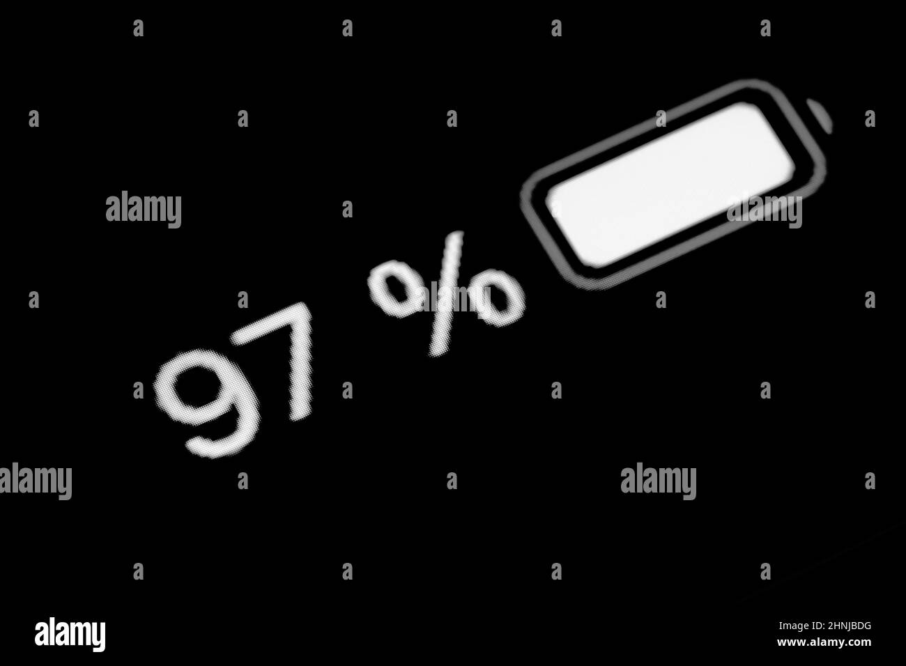 Smartphone charged battery level indicator - 97 percent: close up macro ...