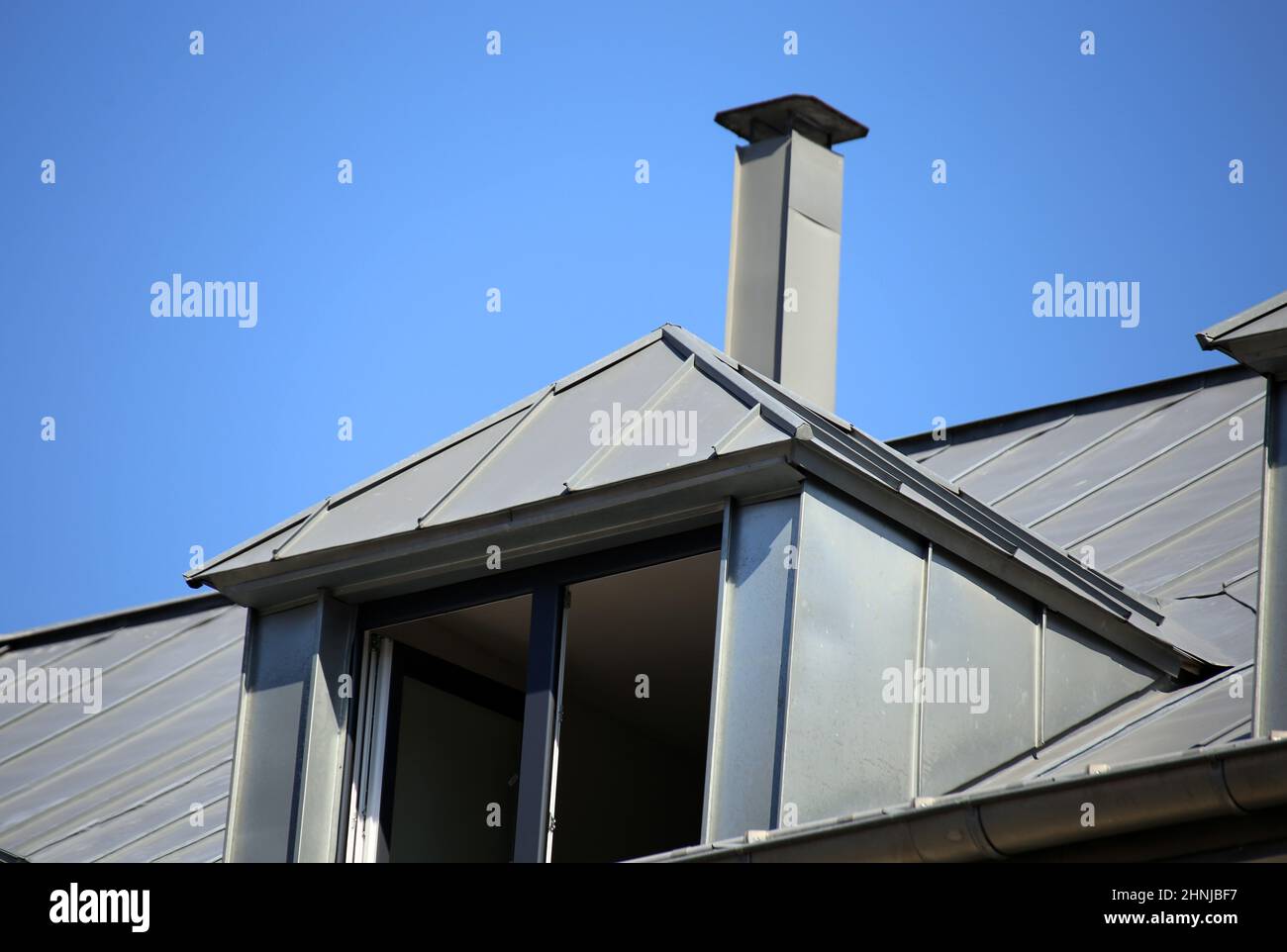 Dormer with zinc cladding on a tiled roof Stock Photo - Alamy