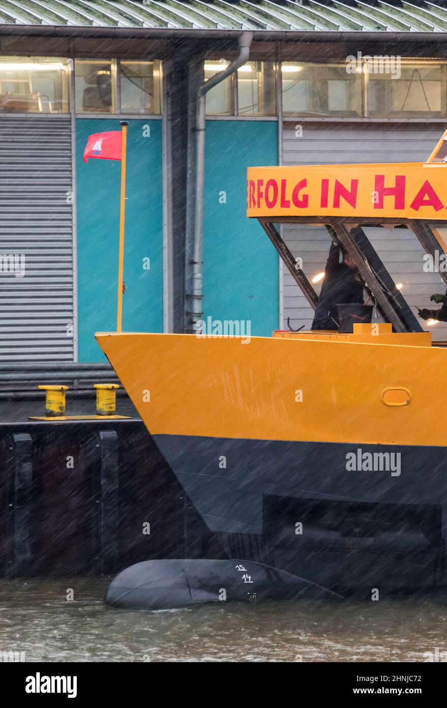Hamburg, Germany. 17th Feb, 2022. The windows of the port ferry Tollerort are being repaired ...
