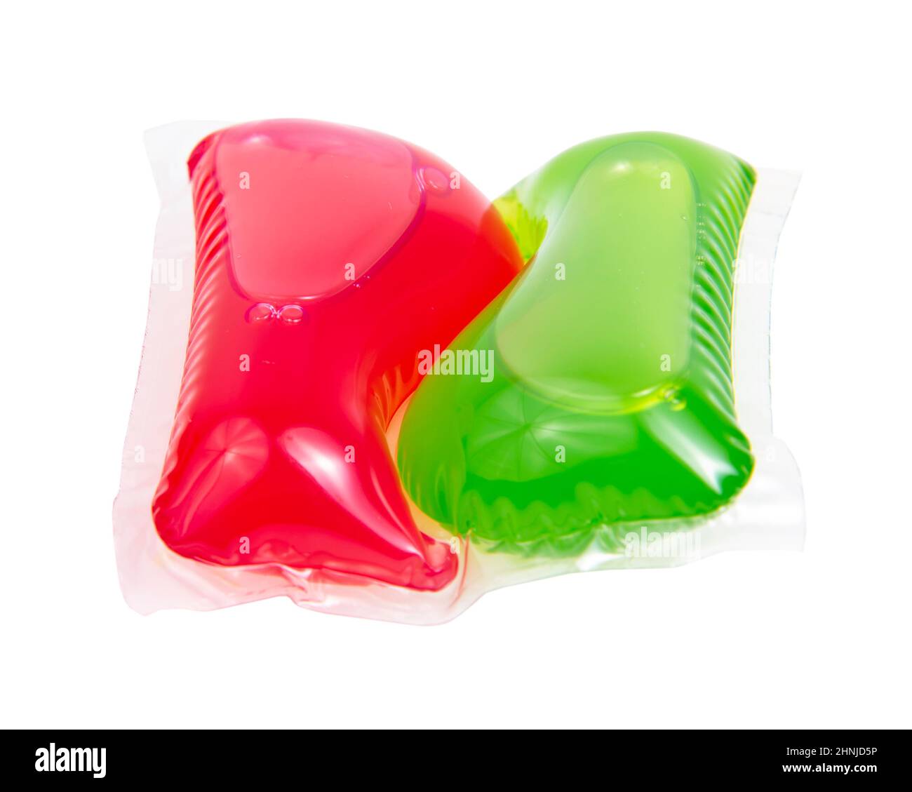 Red green capsule for cloth washing liquid powder isolated on the white ...