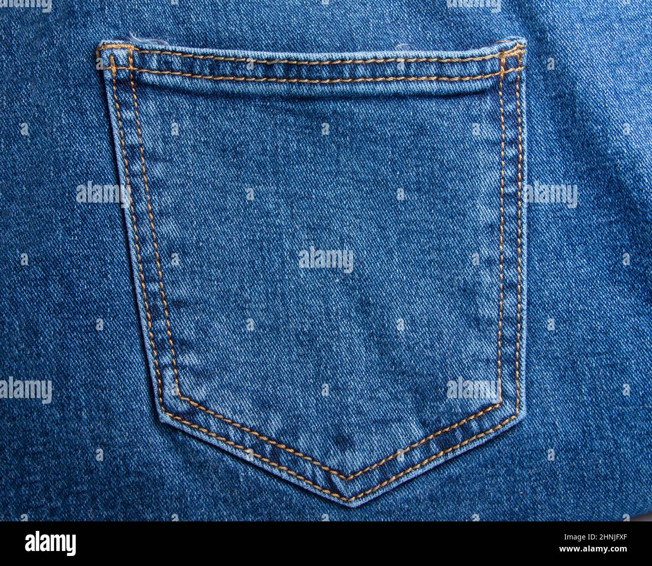 Denim jeans cotton blue pocket texture or background Stock Photo - Alamy