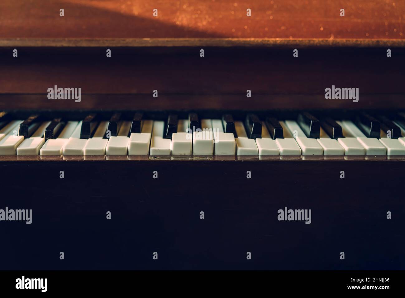 Close up shot to broken piano keys in abandoned house. An ancient ...