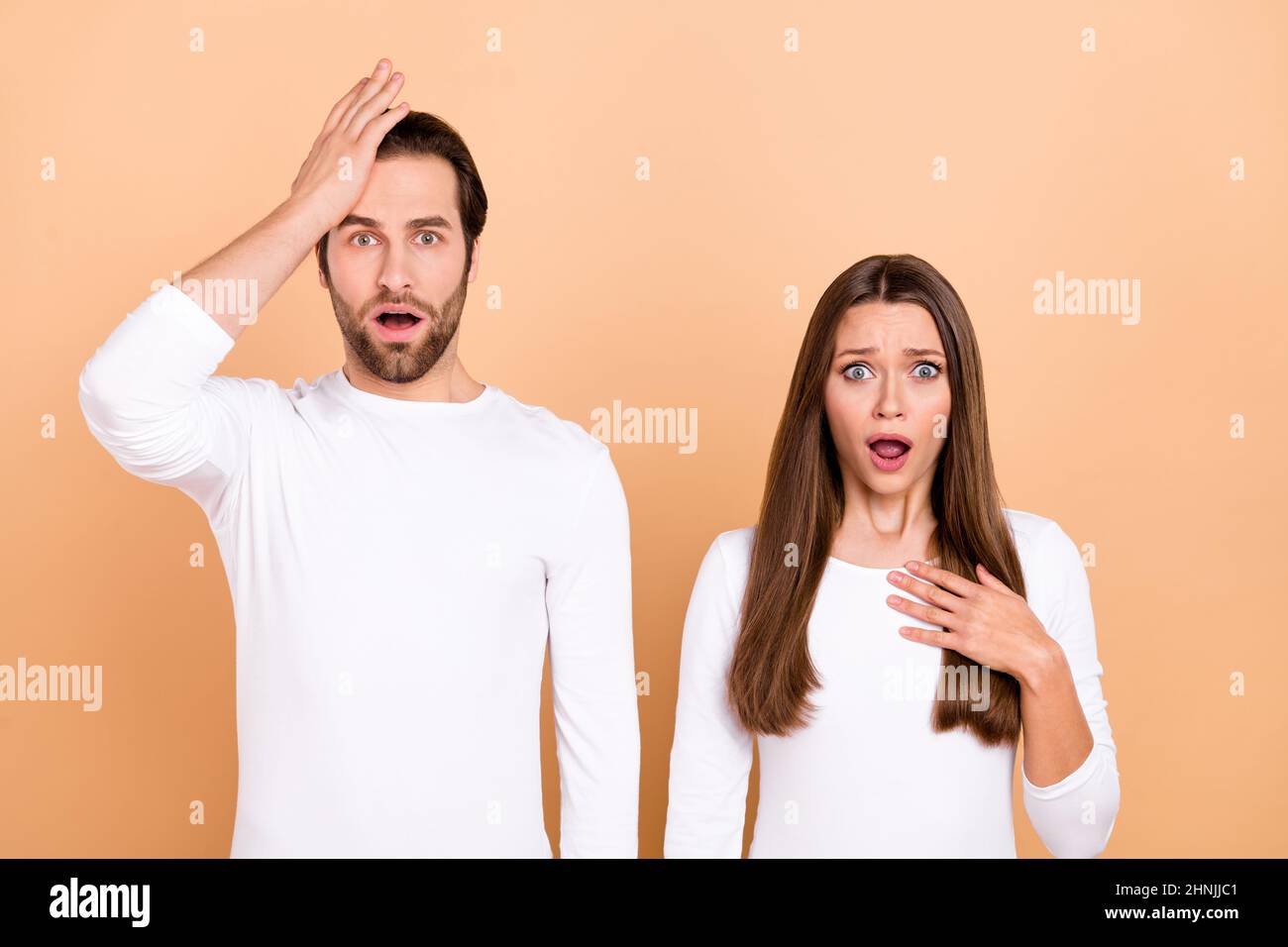 Portrait of attractive outraged puzzled confused spouses bad news ...