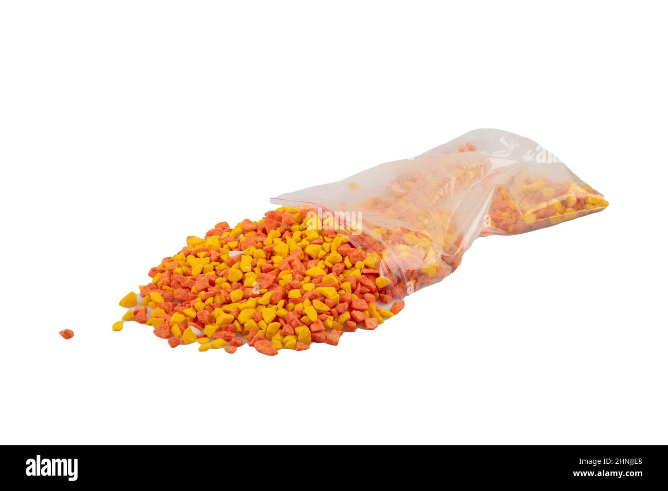 Colorful pebbles in plastic bags for decoration work in craft shop ...