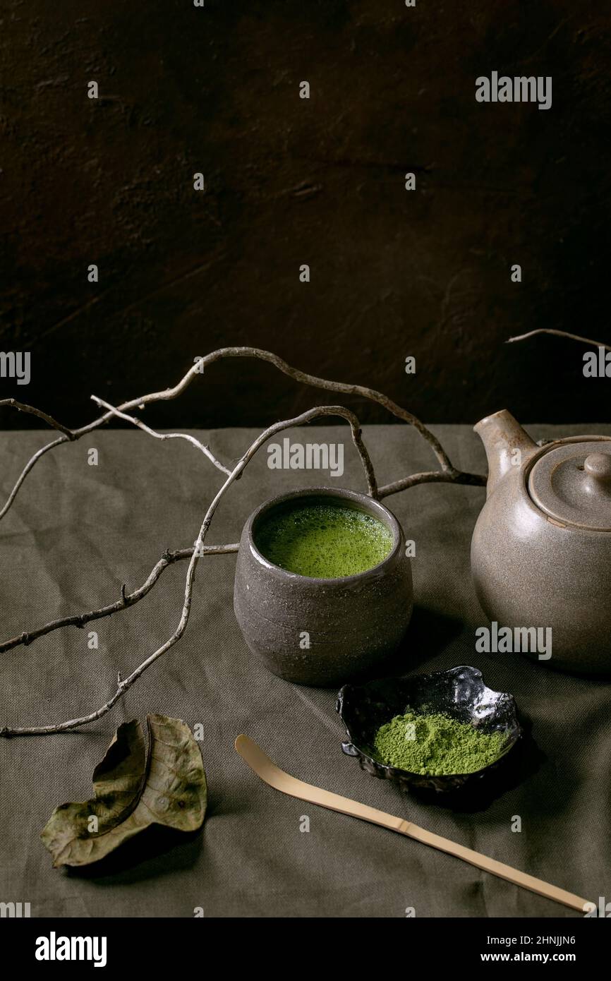 Traditional japanese hot green frothy tea matcha in ceramic cup ...