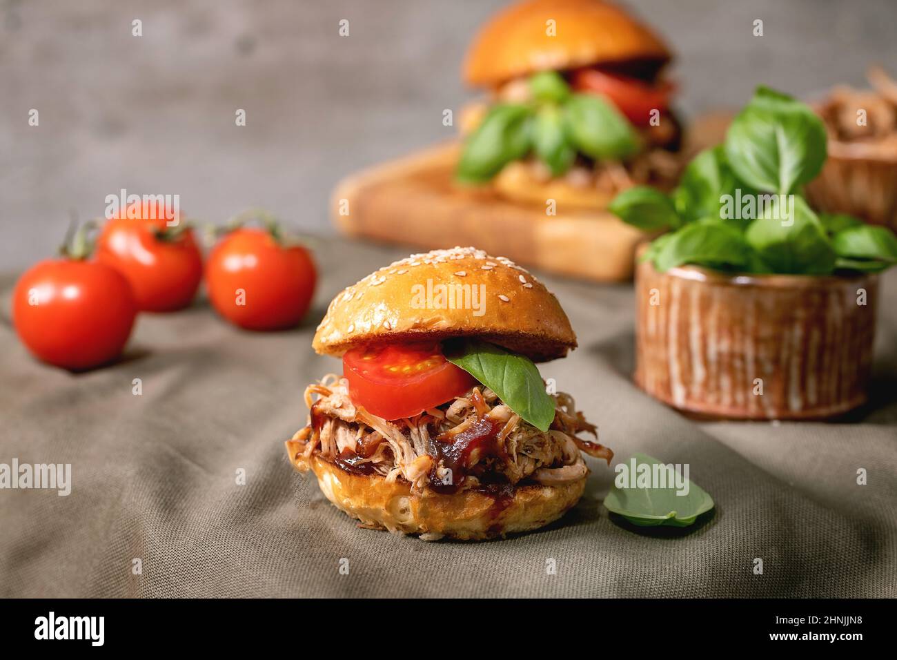 Set of homemade mini burgers with stew beef, tomatoes and basil ...