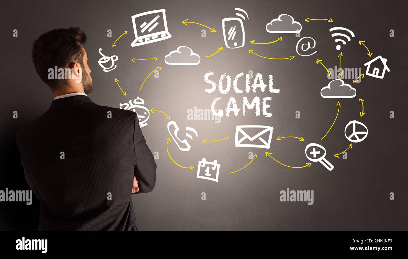 businessman drawing social media icons Stock Photo - Alamy
