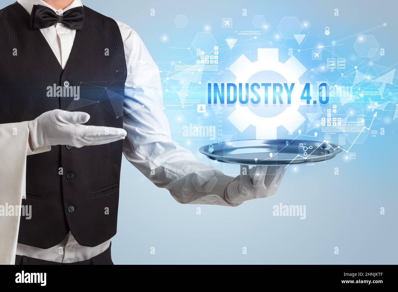 Waiter serving new technology concept Stock Photo - Alamy