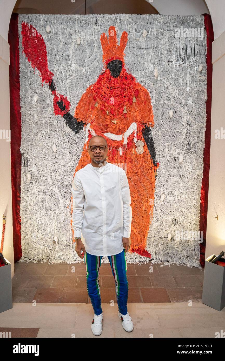 Artist Victor Ehikhamenor with his artwork Still Standing after its ...