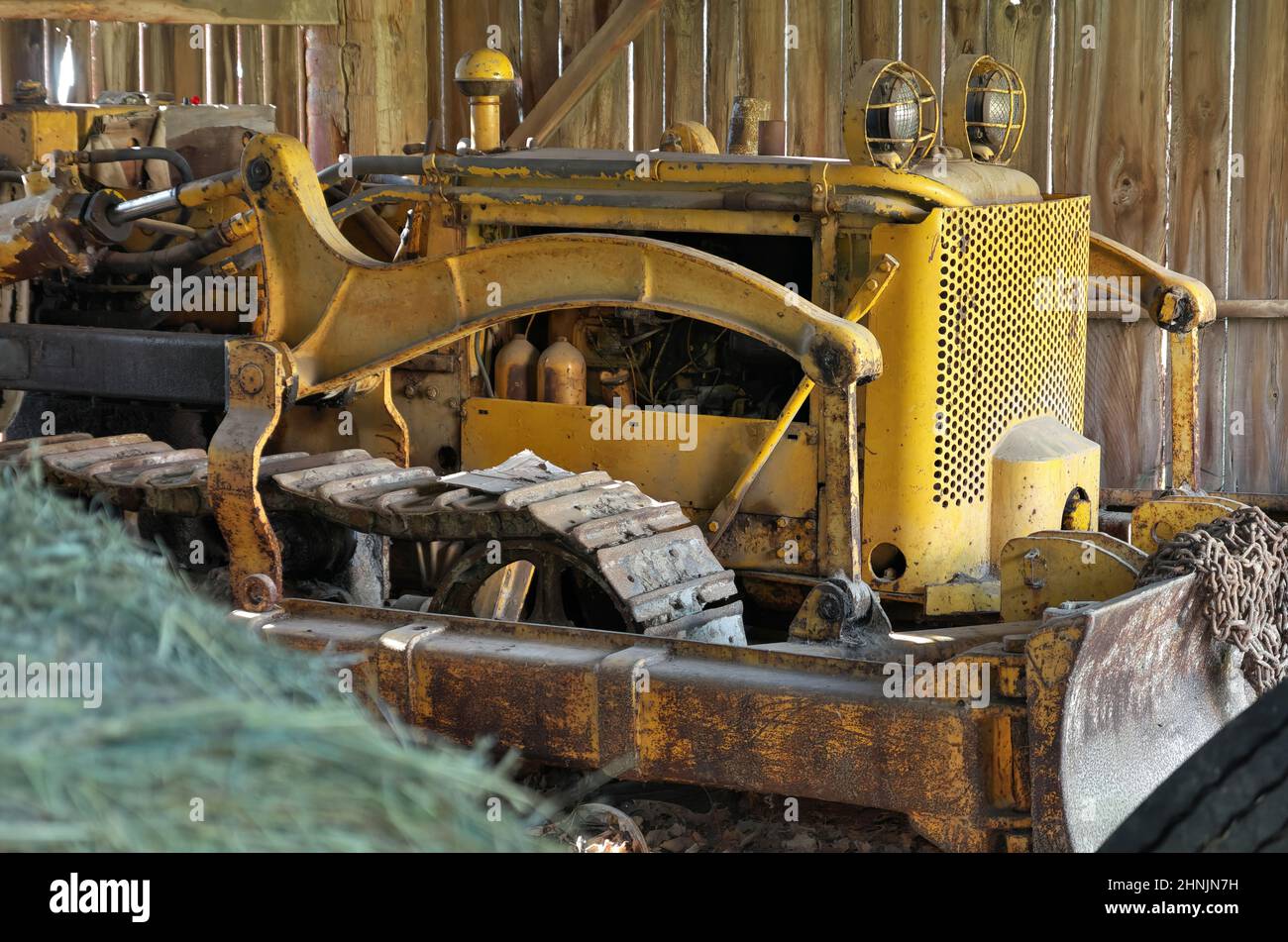 Antique Vintage Bulldozer Stored in an Old Rustic Barn Stock Photo - Alamy
