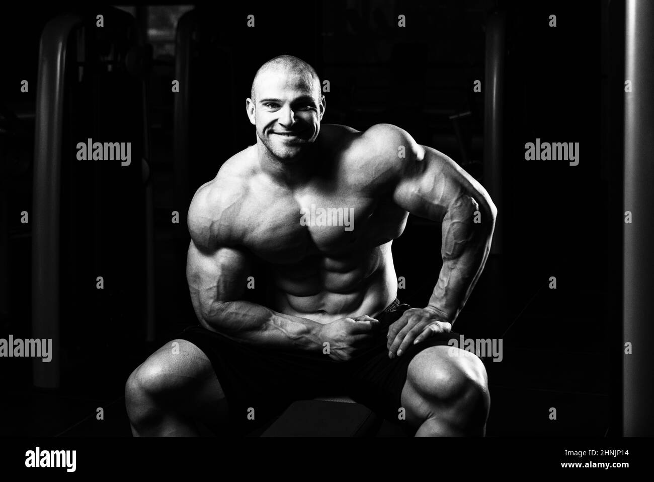 Muscular guy in white Black and White Stock Photos & Images - Alamy