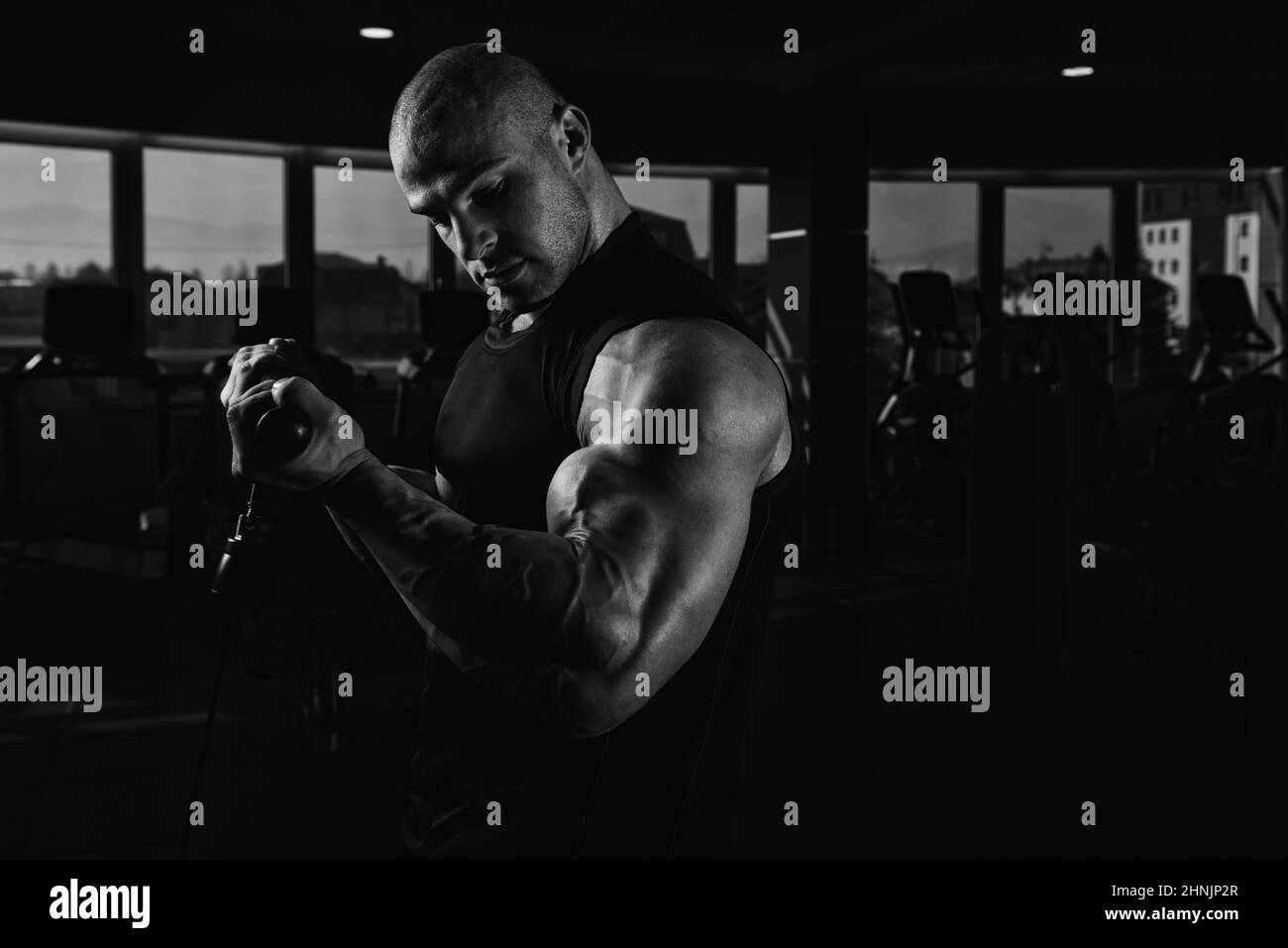 Portrait mature man flexing biceps hi-res stock photography and images ...