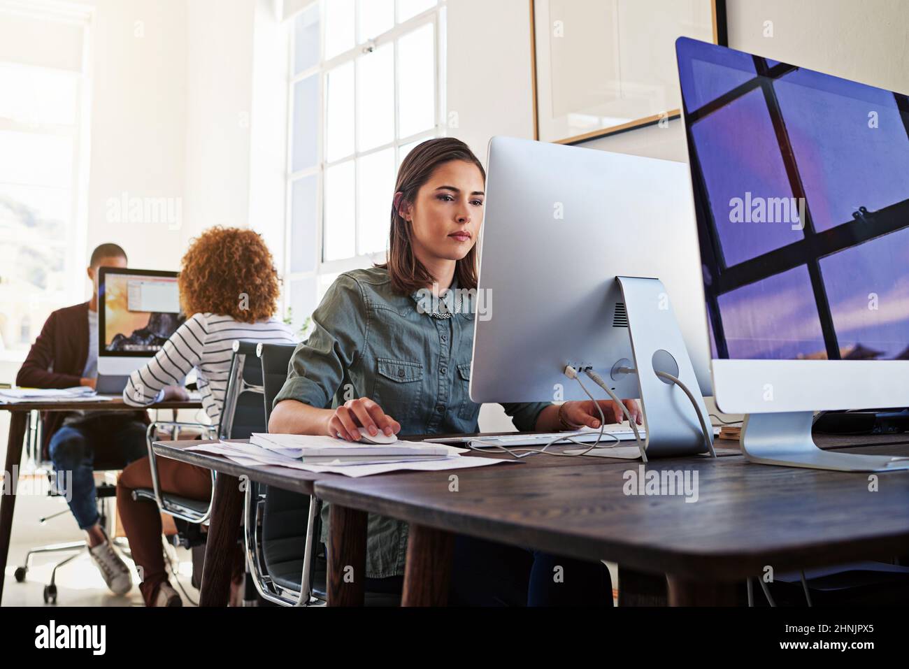 Technology ensures their workday is a productive one. Shot of ...