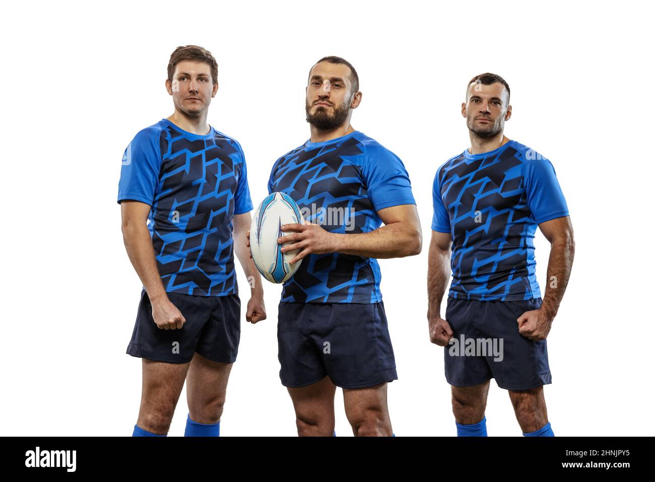 Group portrait of strong athletes, rugby players standing together like ...