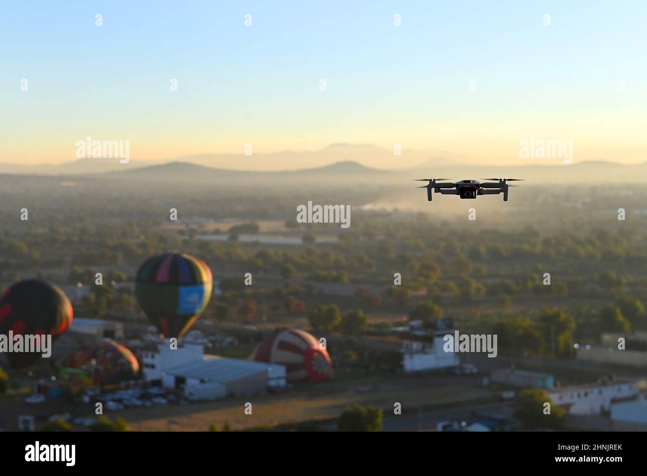 Mexico, Mexico City, Aerial view of Drone flying above hot air balloons ...