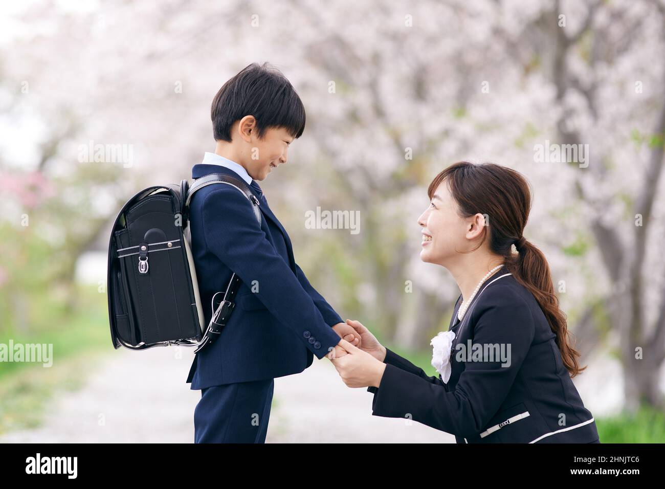 Japanese Elementary School Boy And His Mother Facing Each Other Stock Photo - Alamy