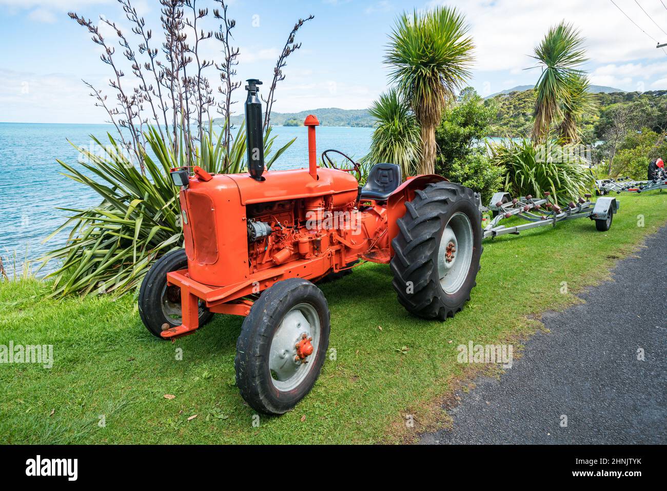 Small red tractor hi-res stock photography and images - Alamy