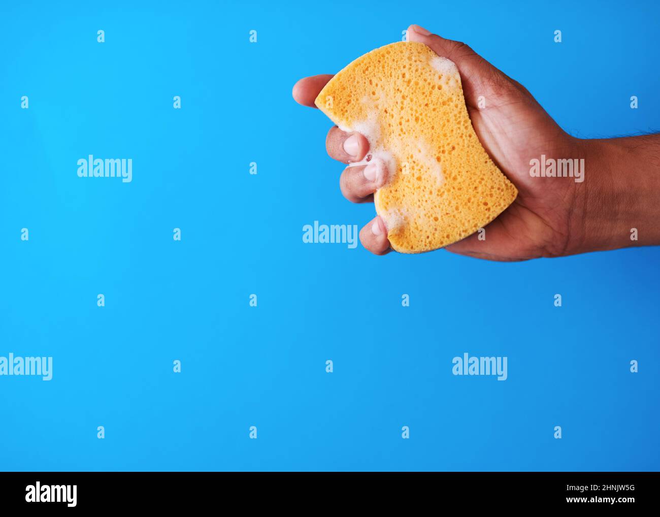 Hand squeeze sponge hi-res stock photography and images - Alamy