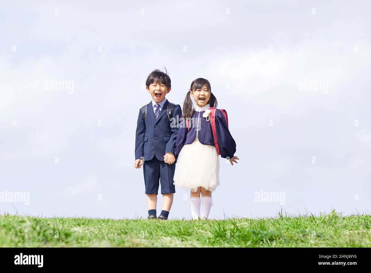 Japanese Elementary School Student Holding Hands Stock Photo - Alamy