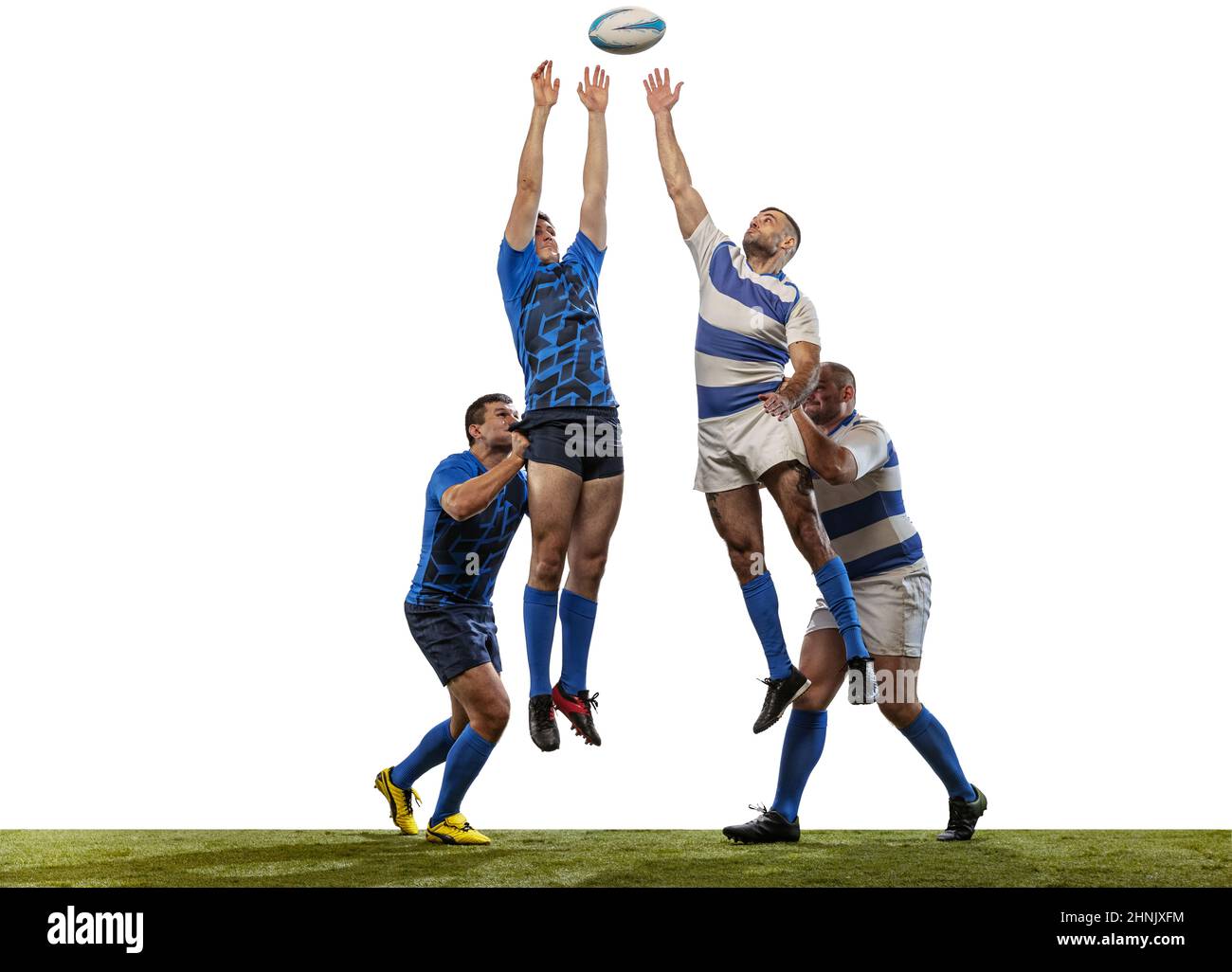 Sportive men, professional rugby players playing rugby football on ...