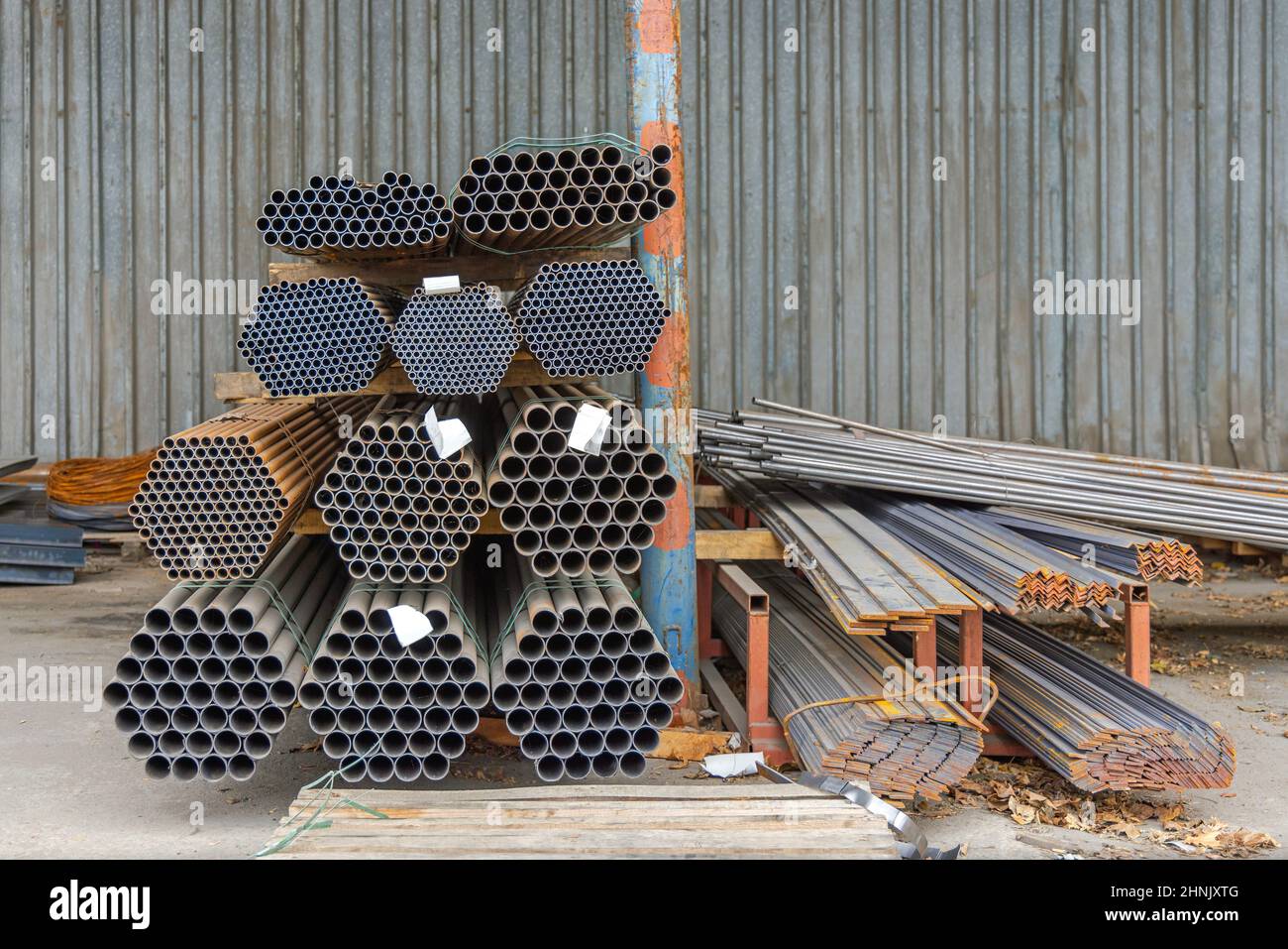 Steel Pipes at Shelf in Construction Material Warehouse Stock Photo - Alamy