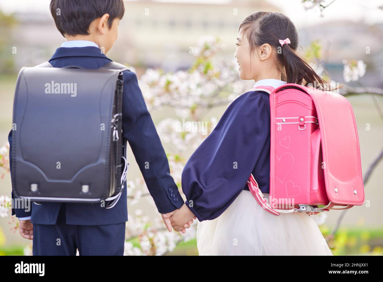 Japanese Elementary School Student Holding Hands Stock Photo - Alamy