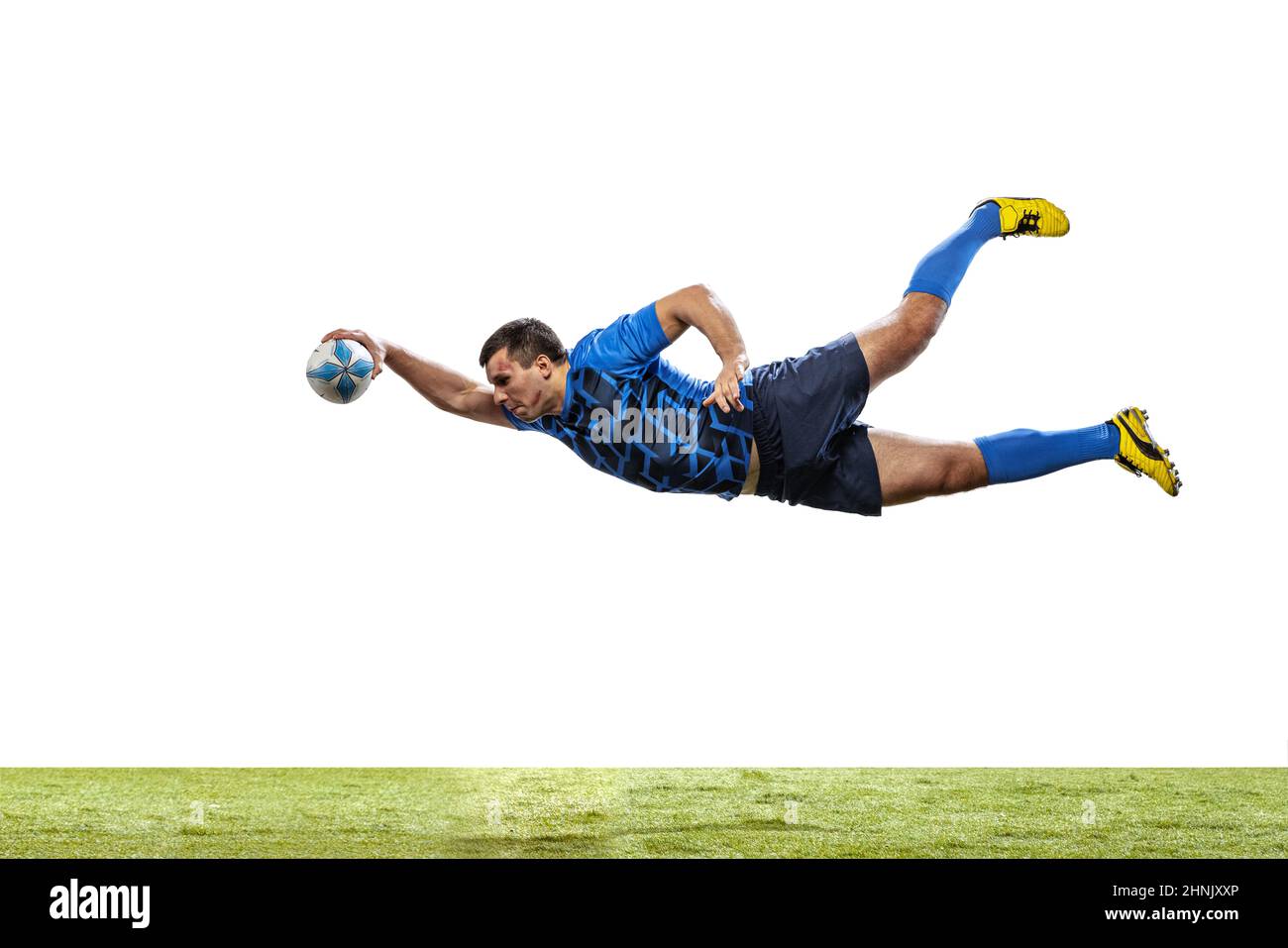 One man, rugby player catching ball in jump isolated on white ...