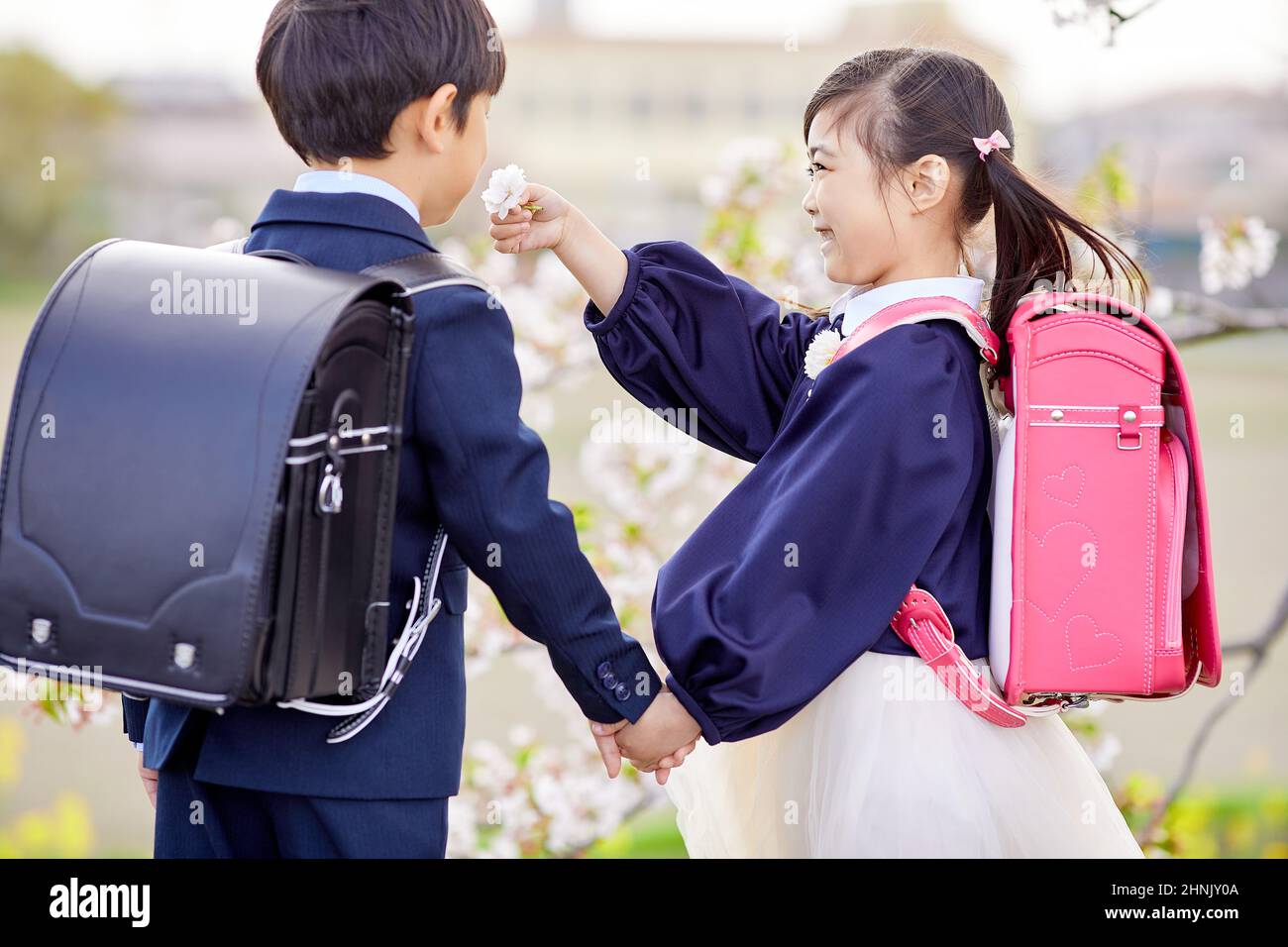 Japanese Elementary School Student Holding Hands Stock Photo - Alamy