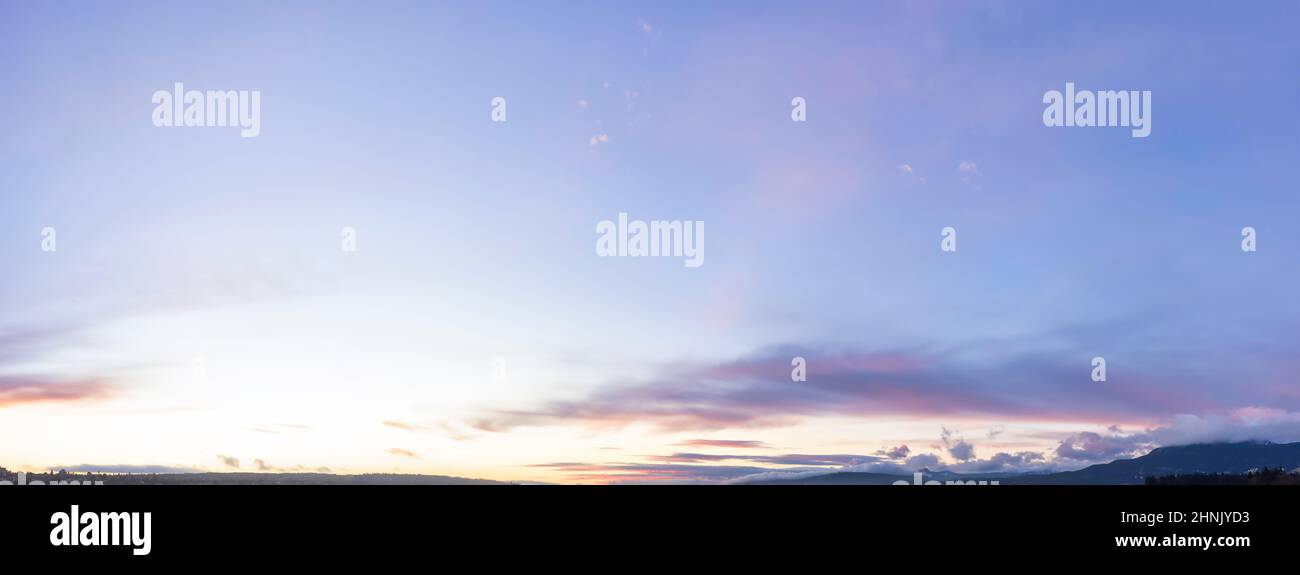 Panoramic View of Cloudscape during a colorful sunset or sunrise Stock ...