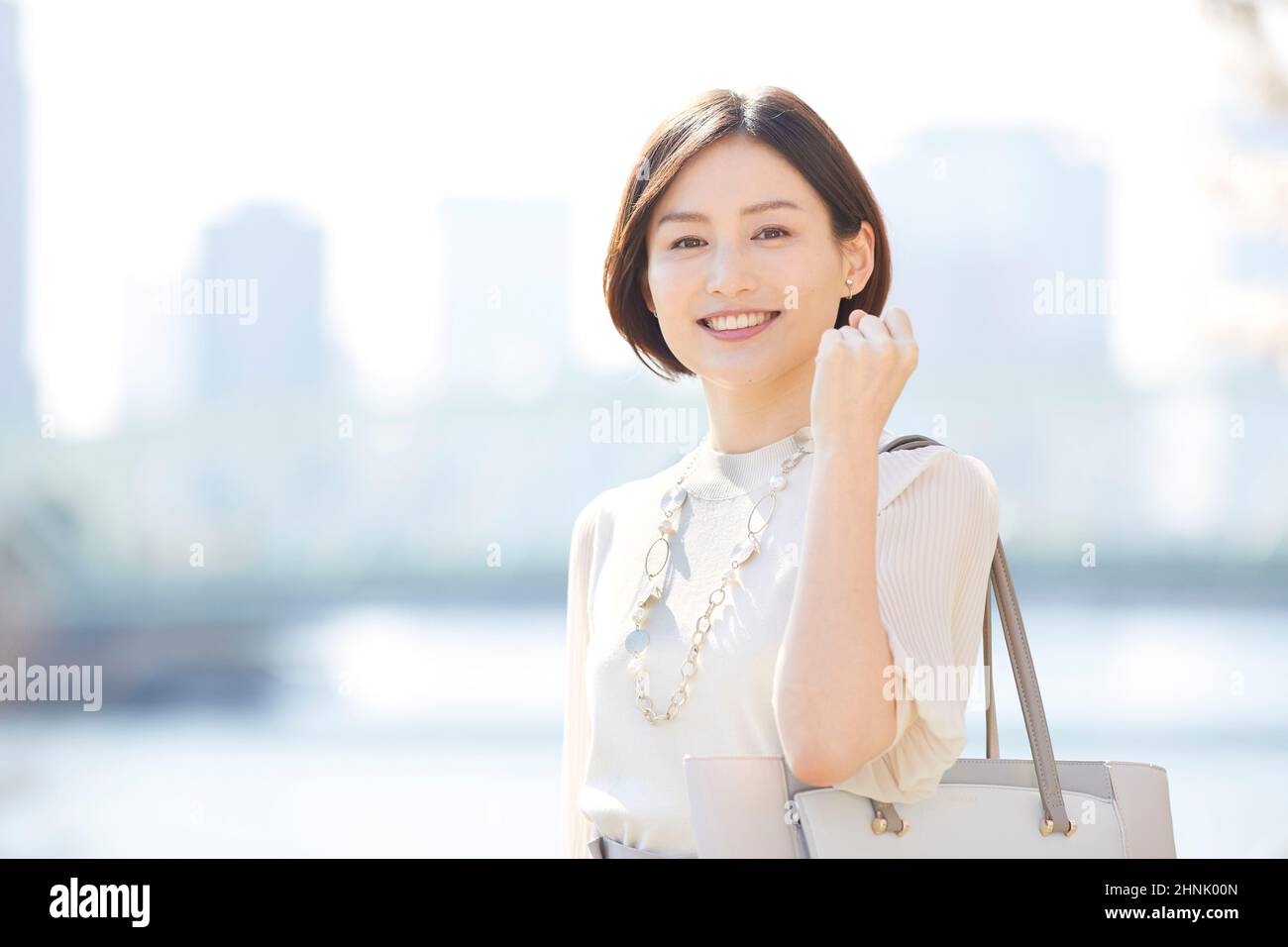 Smiling japanese woman making hi-res stock photography and images - Alamy