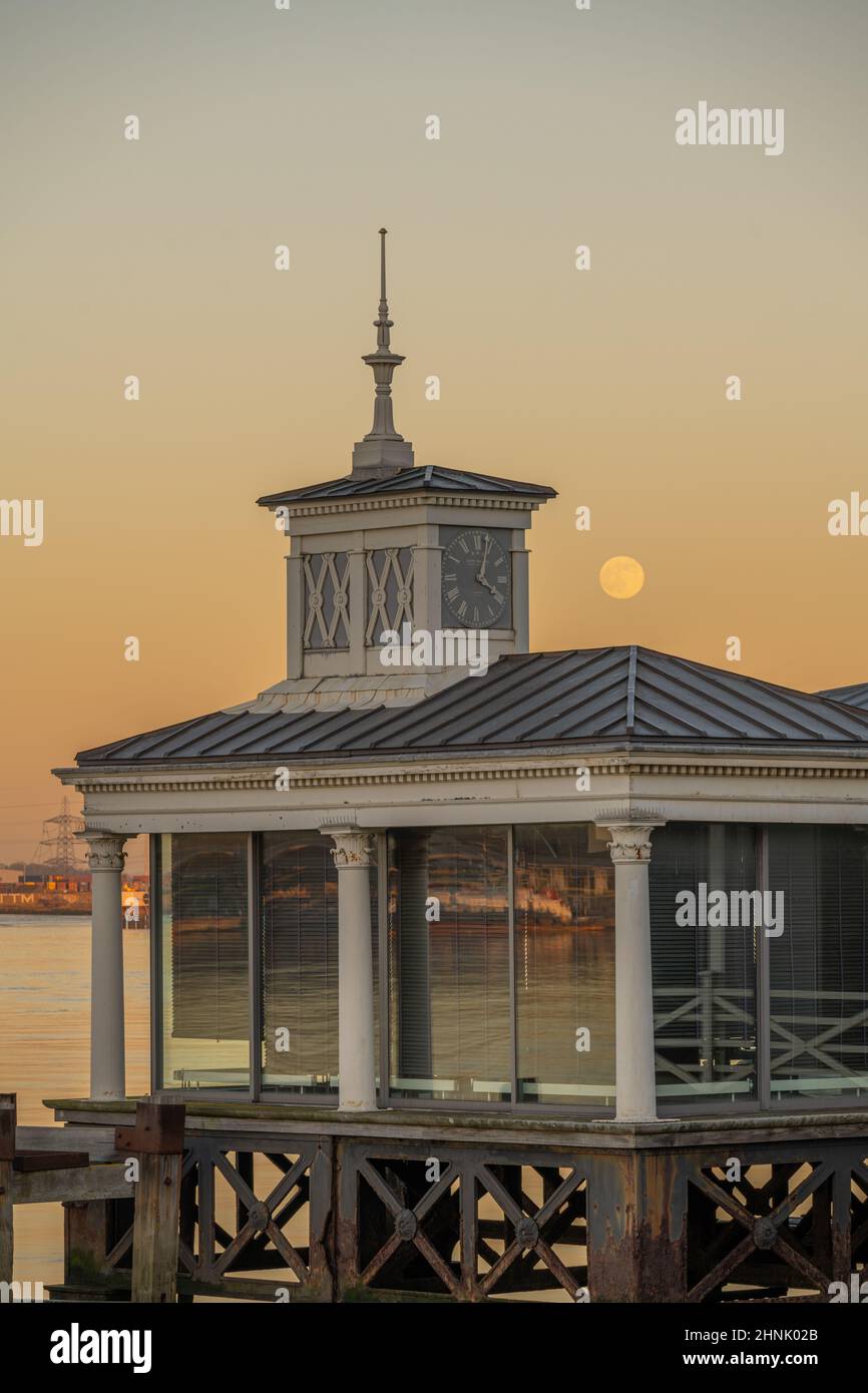 The town pier at Gravesend with a Full moon rising over Essex Stock ...