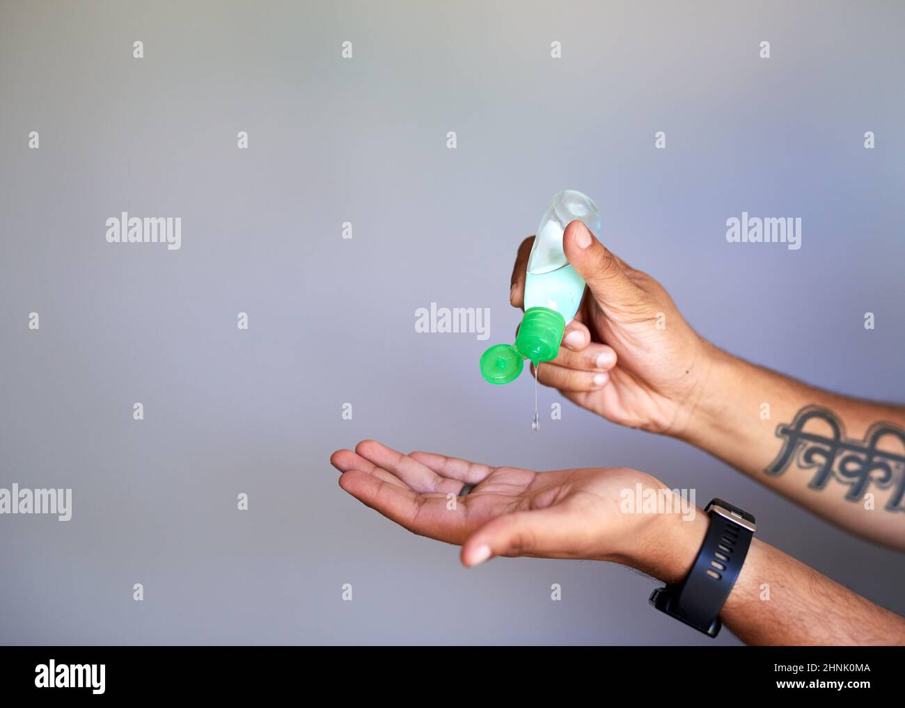 Hand squeezing alcohol space hi-res stock photography and images - Alamy