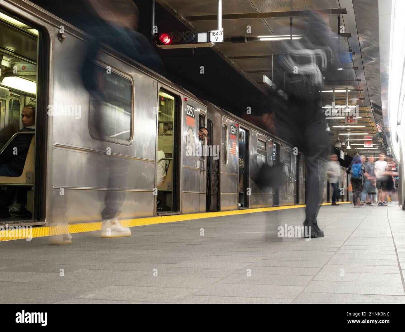 Image of people getting on a subway train in WTC Cortlandt station, New ...