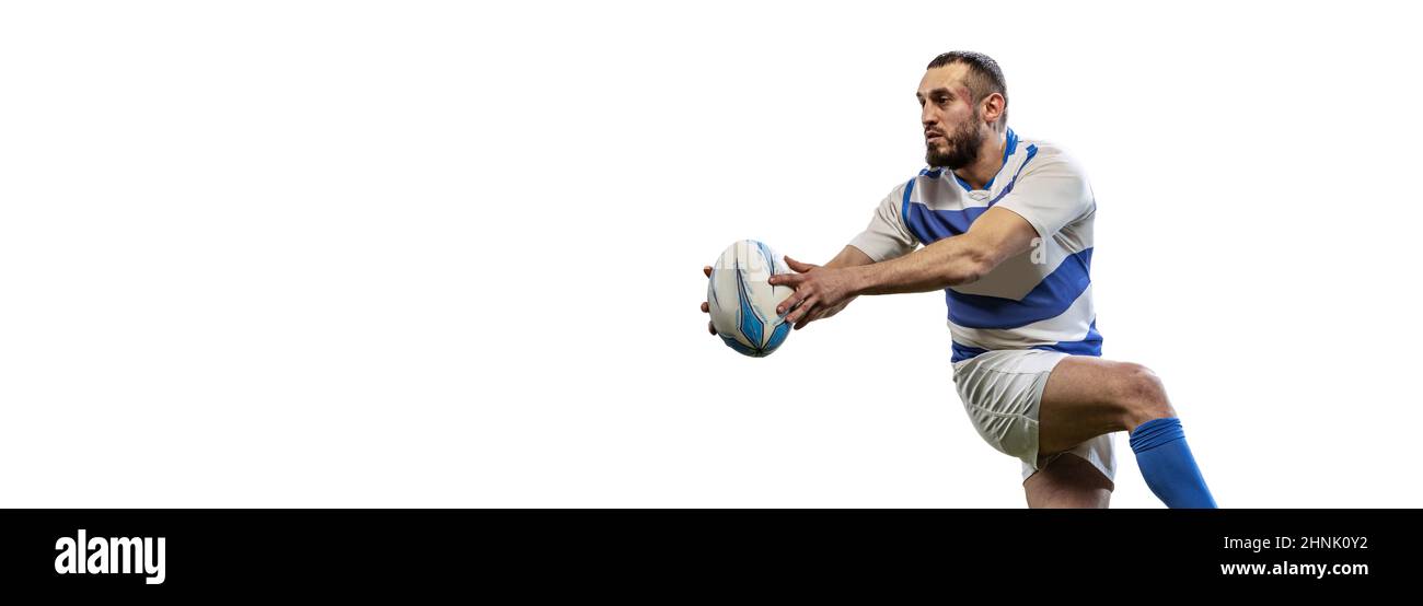 Fast forward. Male rugby player catching ball in jump isolated on white ...