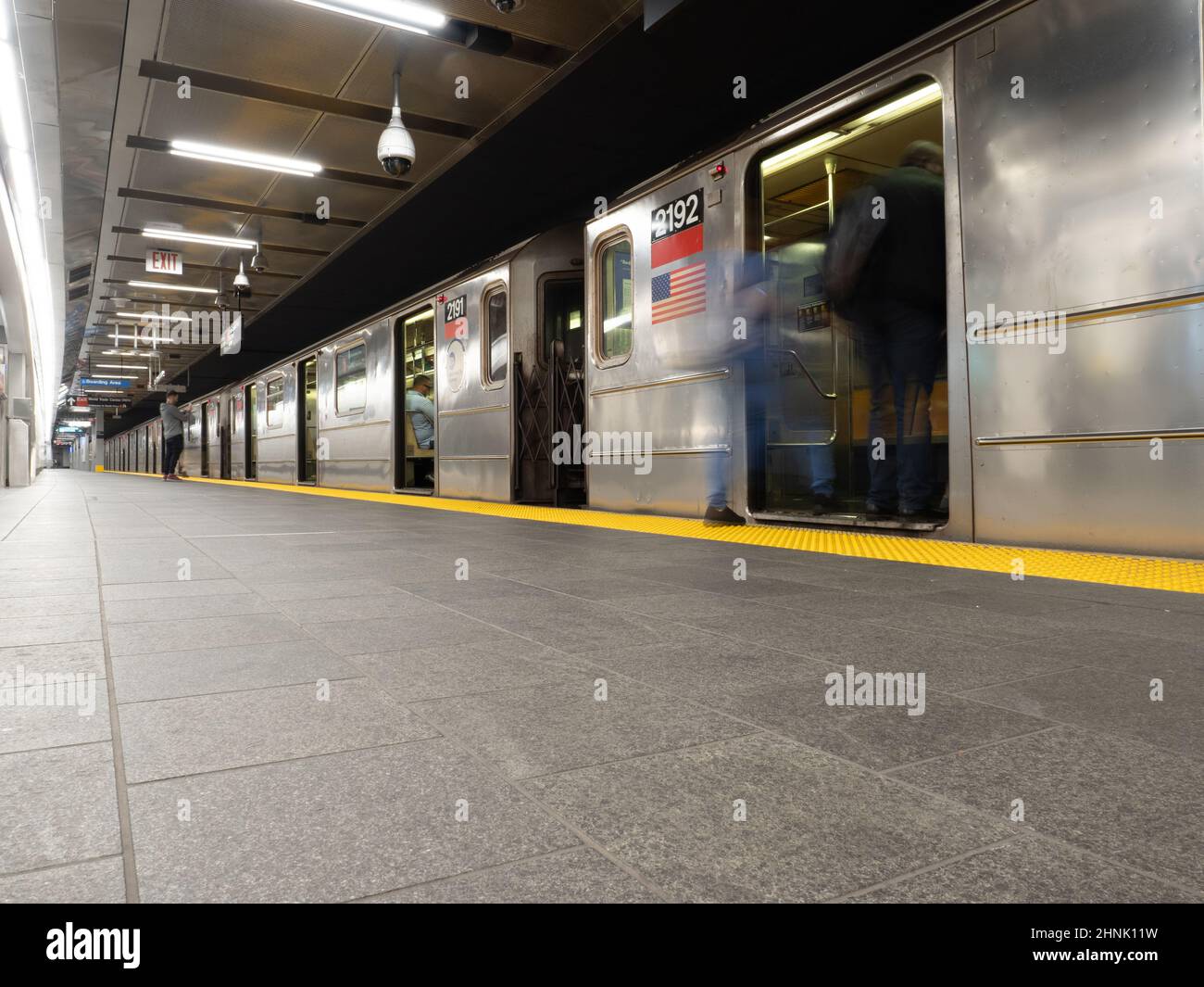 Image of people getting on a subway train in WTC Cortlandt station, New ...