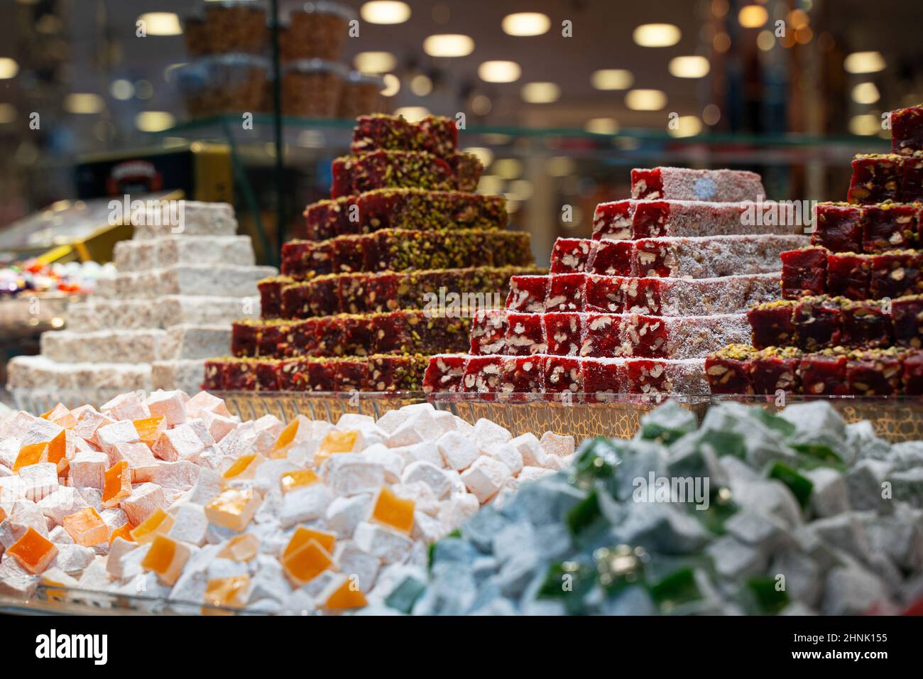 rows of Turkish delight sweets desserts assorted with dried fruits ...