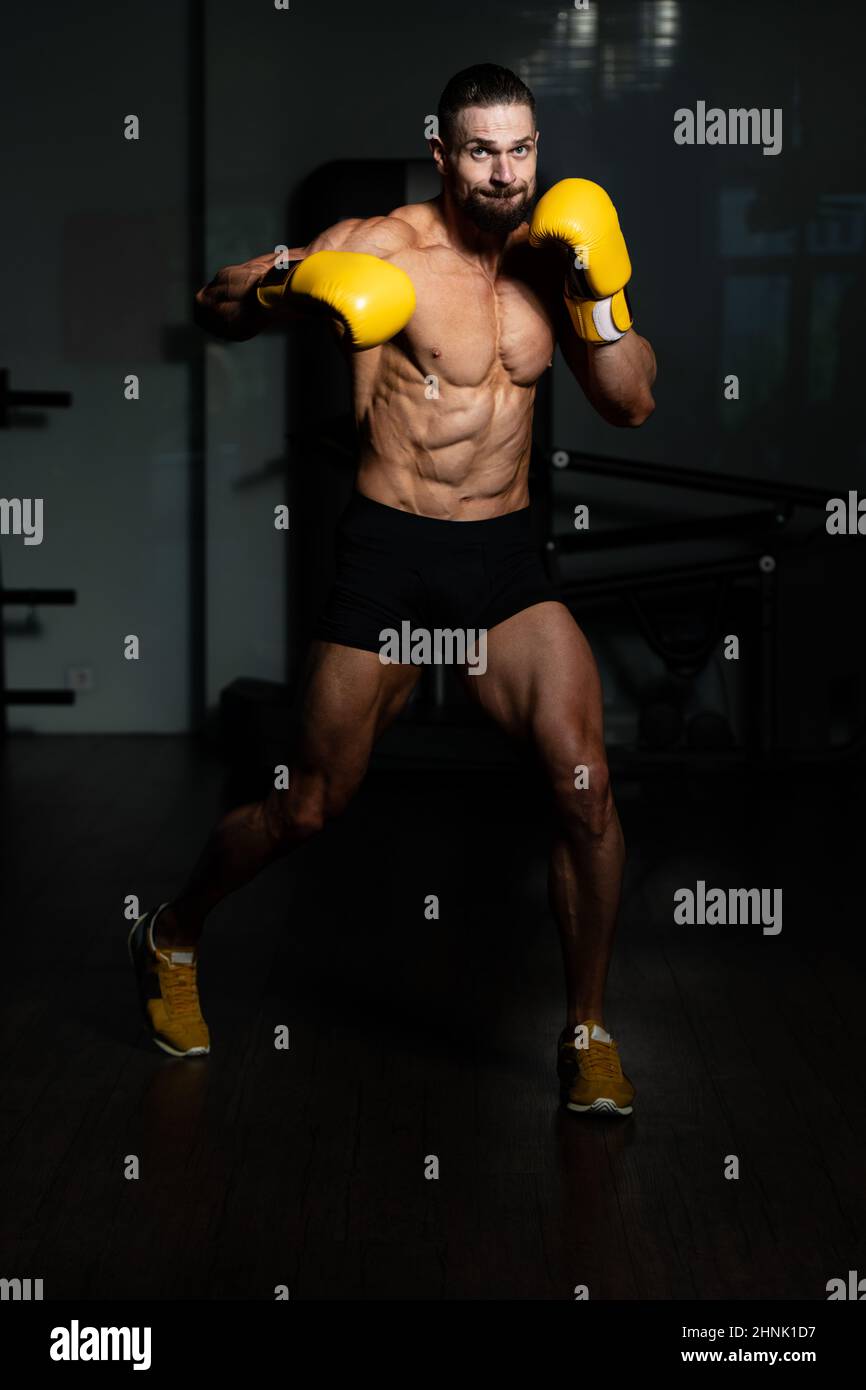 Attractive Man Boxing In Gym Stock Photo - Alamy