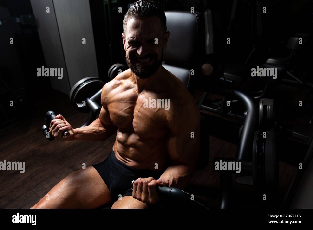 Bodybuilder Exercising Biceps Stock Photo - Alamy