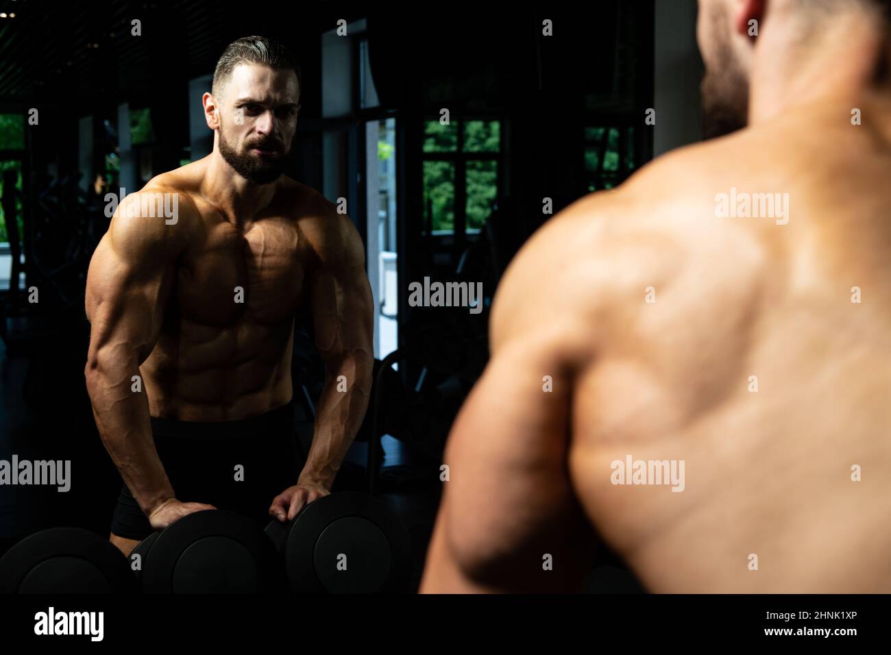 Muscular Man After Exercise Resting In Gym Stock Photo - Alamy