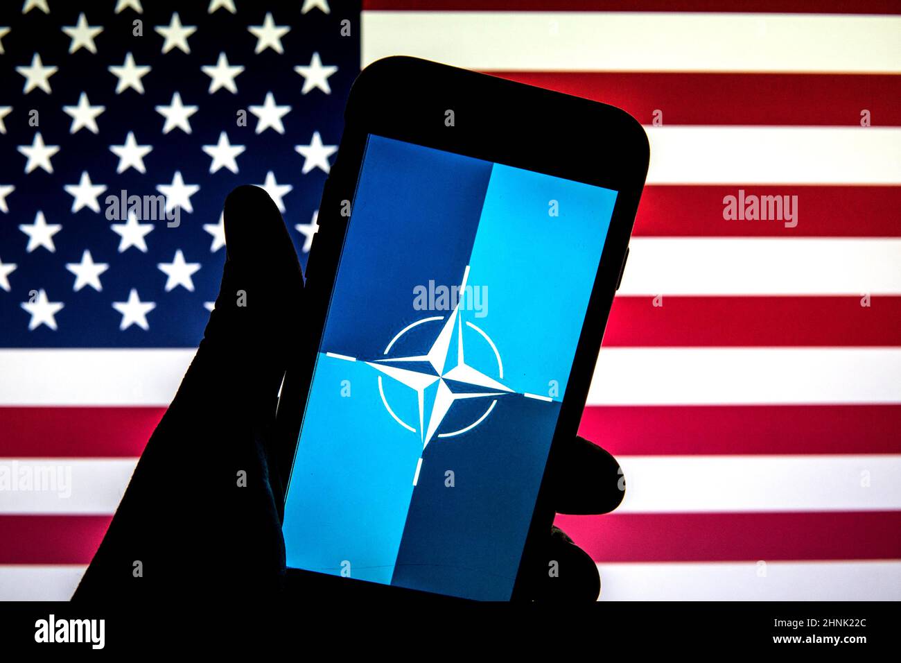 In this photo illustration, a NATO (North Atlantic Treaty Organization ...