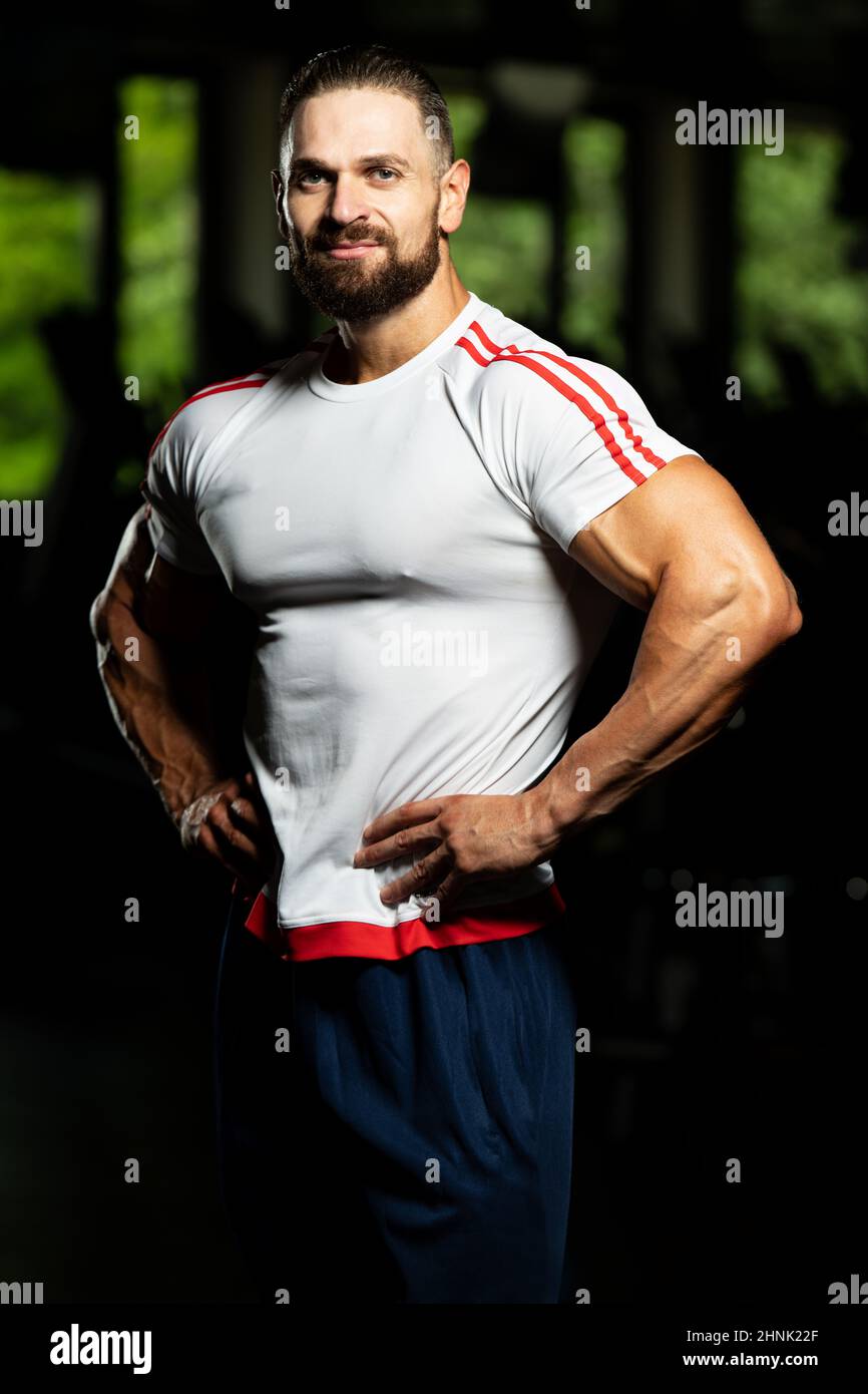 Muscular Man After Exercise Resting In Gym Stock Photo - Alamy