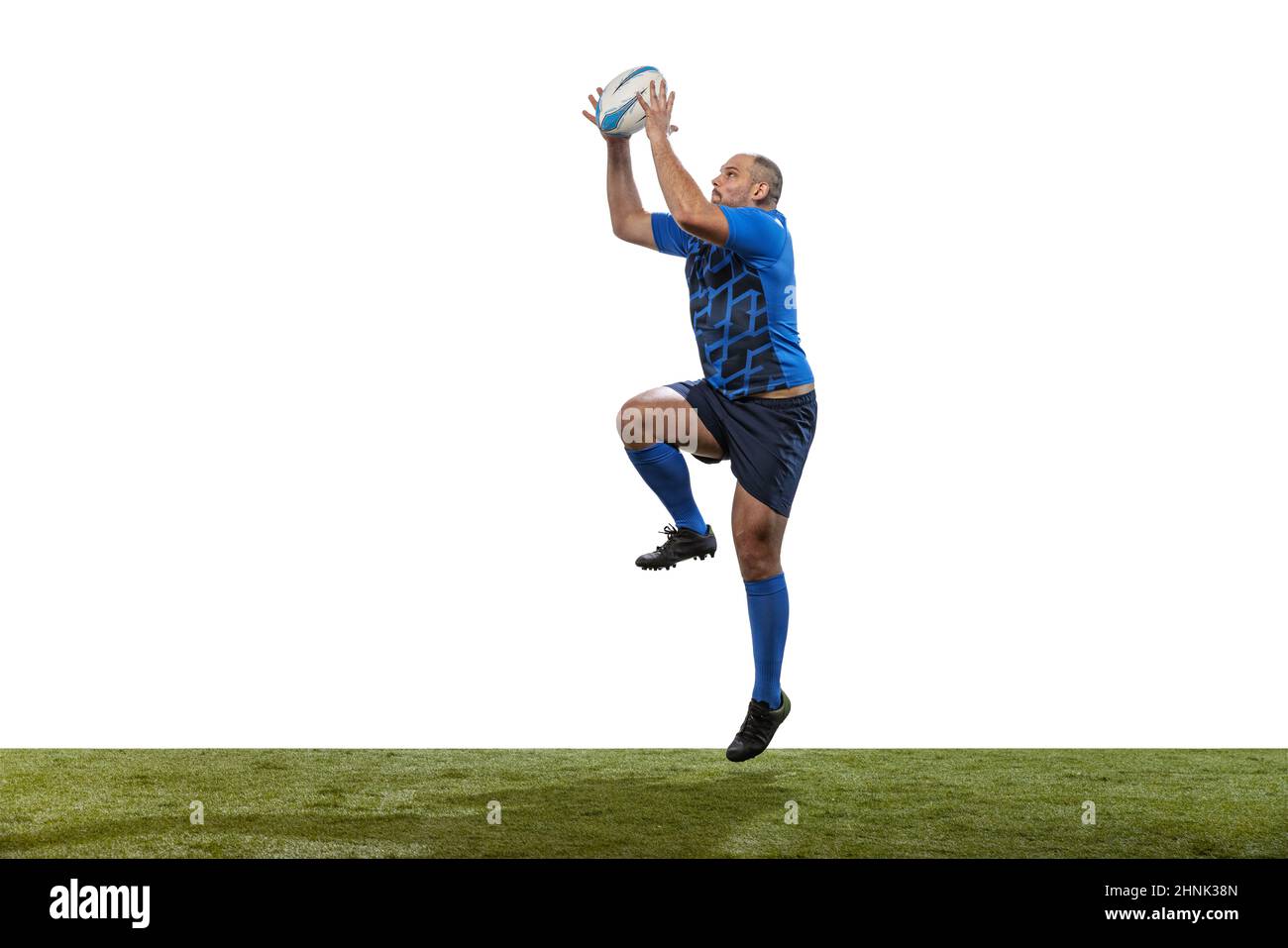 Fast forward. Male rugby player catching ball in jump isolated on white ...