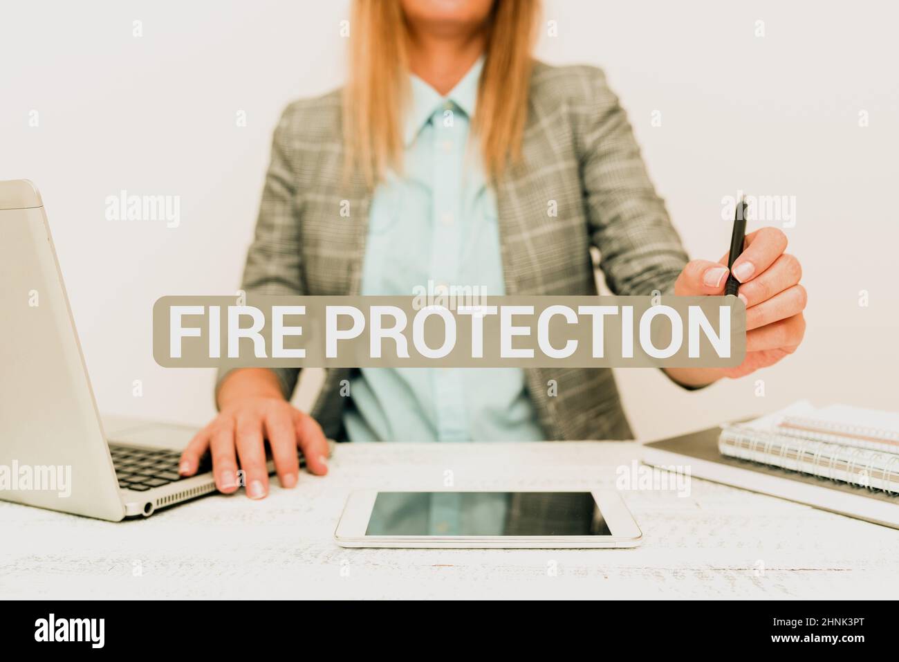 Hand writing sign Fire Protection, Business concept measures taken to ...