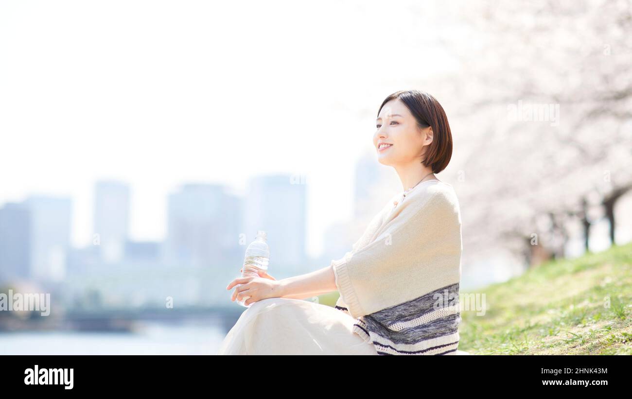 Young Japanese Woman With Water Stock Photo - Alamy