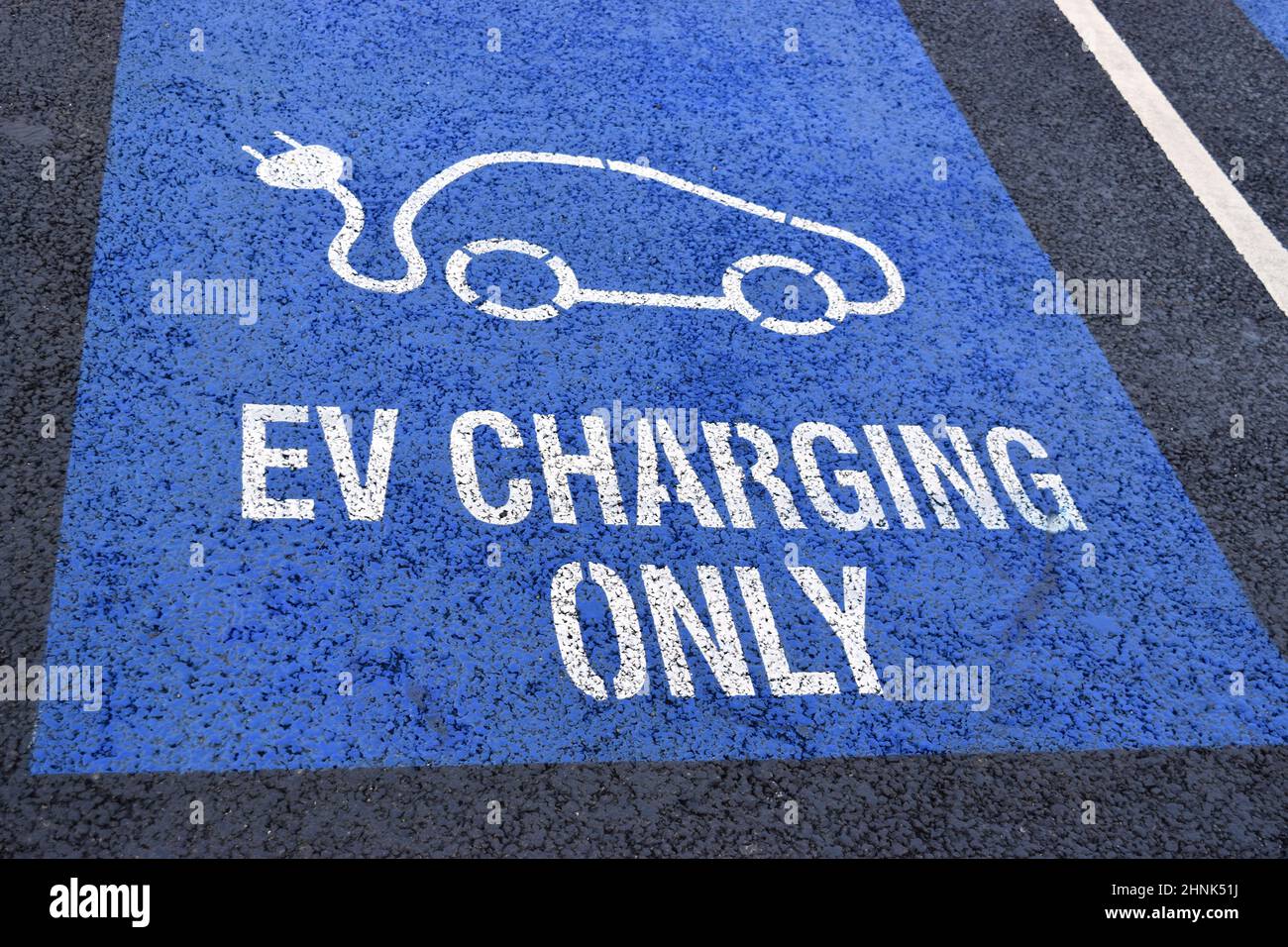 EV charging only sign in London Heathrow Stock Photo - Alamy