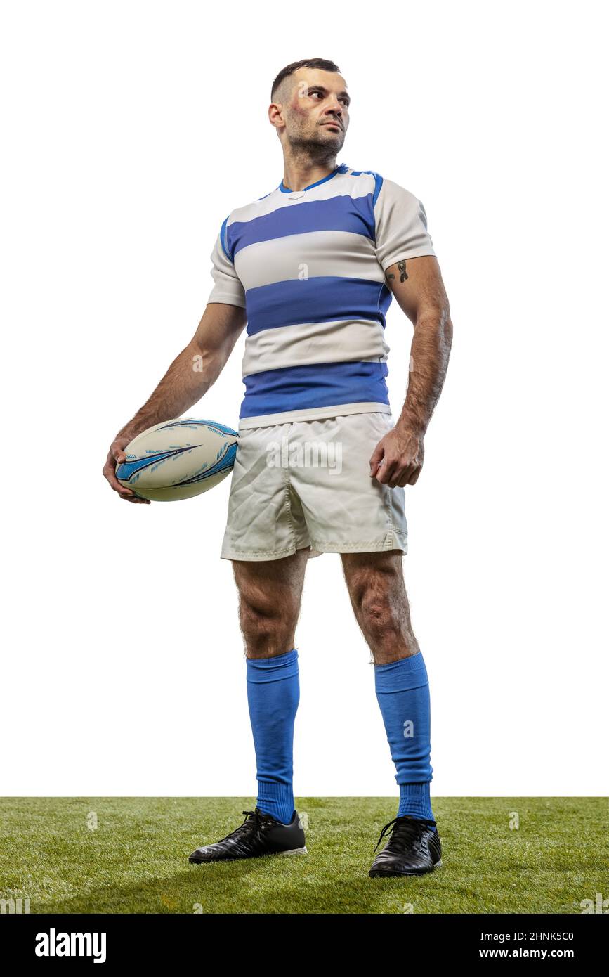 Portrait of serious man, rugby player posing with ball isolated on ...